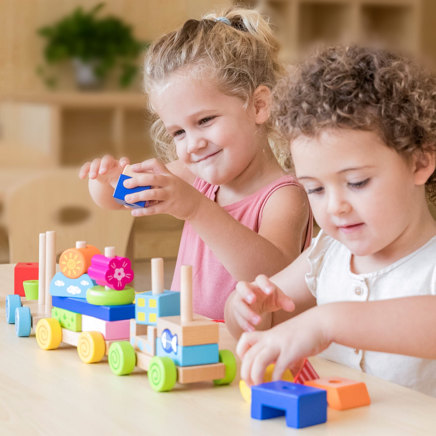 Building and Rolling Fun: The Stacking Train Toy- Kinderlife